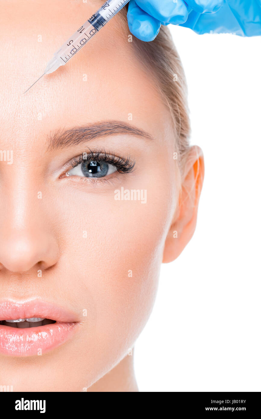 Woman getting an injection hi-res stock photography and images - Alamy