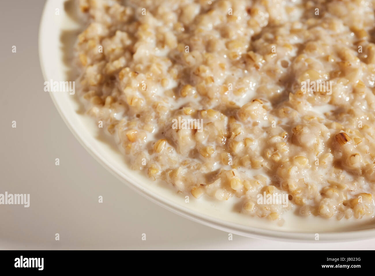 a bowl of cooked organic, pinhead, oatmeal Stock Photo - Alamy