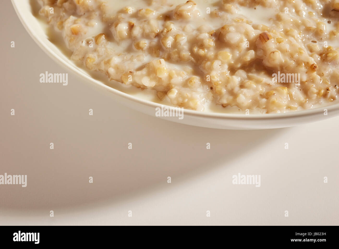 a bowl of cooked organic, pinhead, oatmeal Stock Photo - Alamy