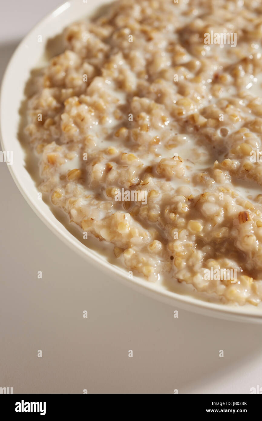 a bowl of cooked organic, pinhead, oatmeal Stock Photo - Alamy