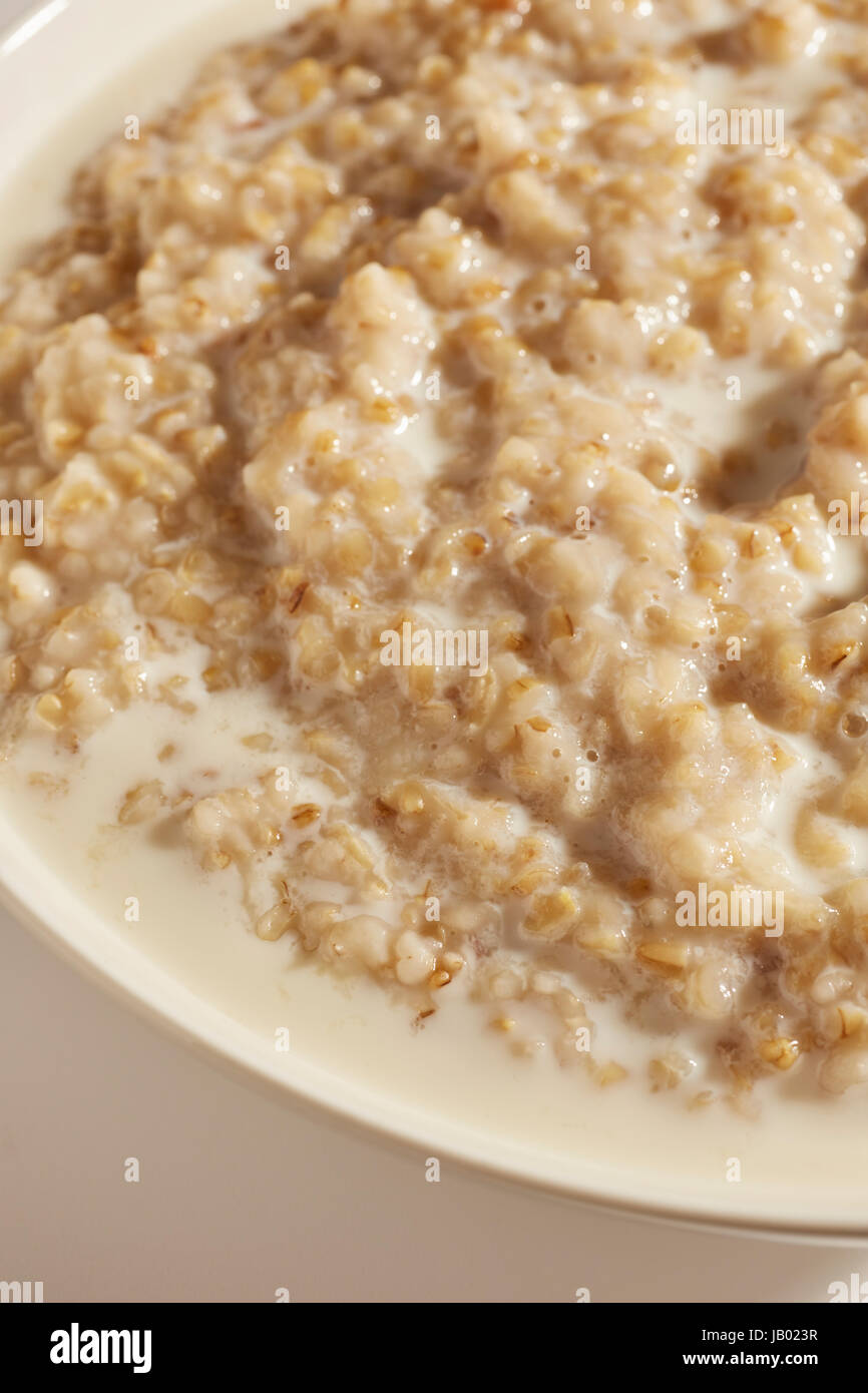 a bowl of cooked organic, pinhead, oatmeal Stock Photo - Alamy