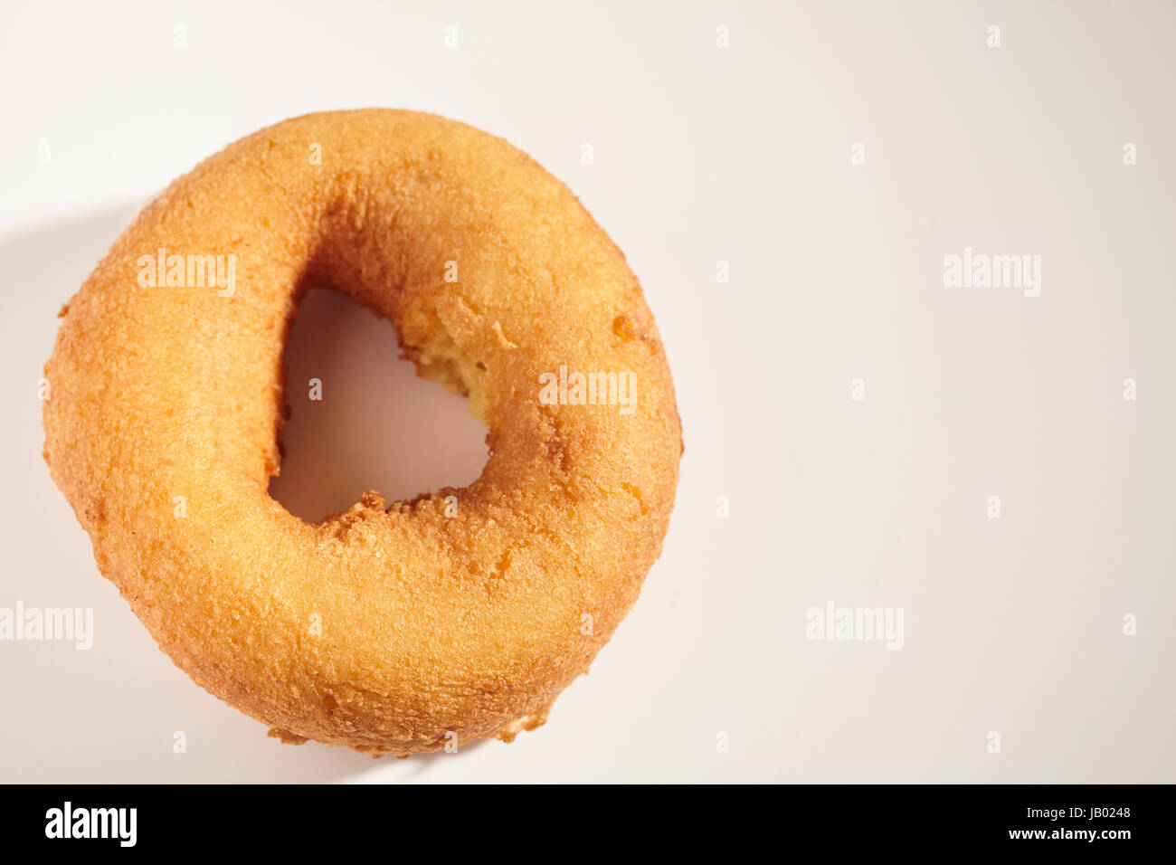 Plain doughnut, sometimes called a donut Stock Photo - Alamy
