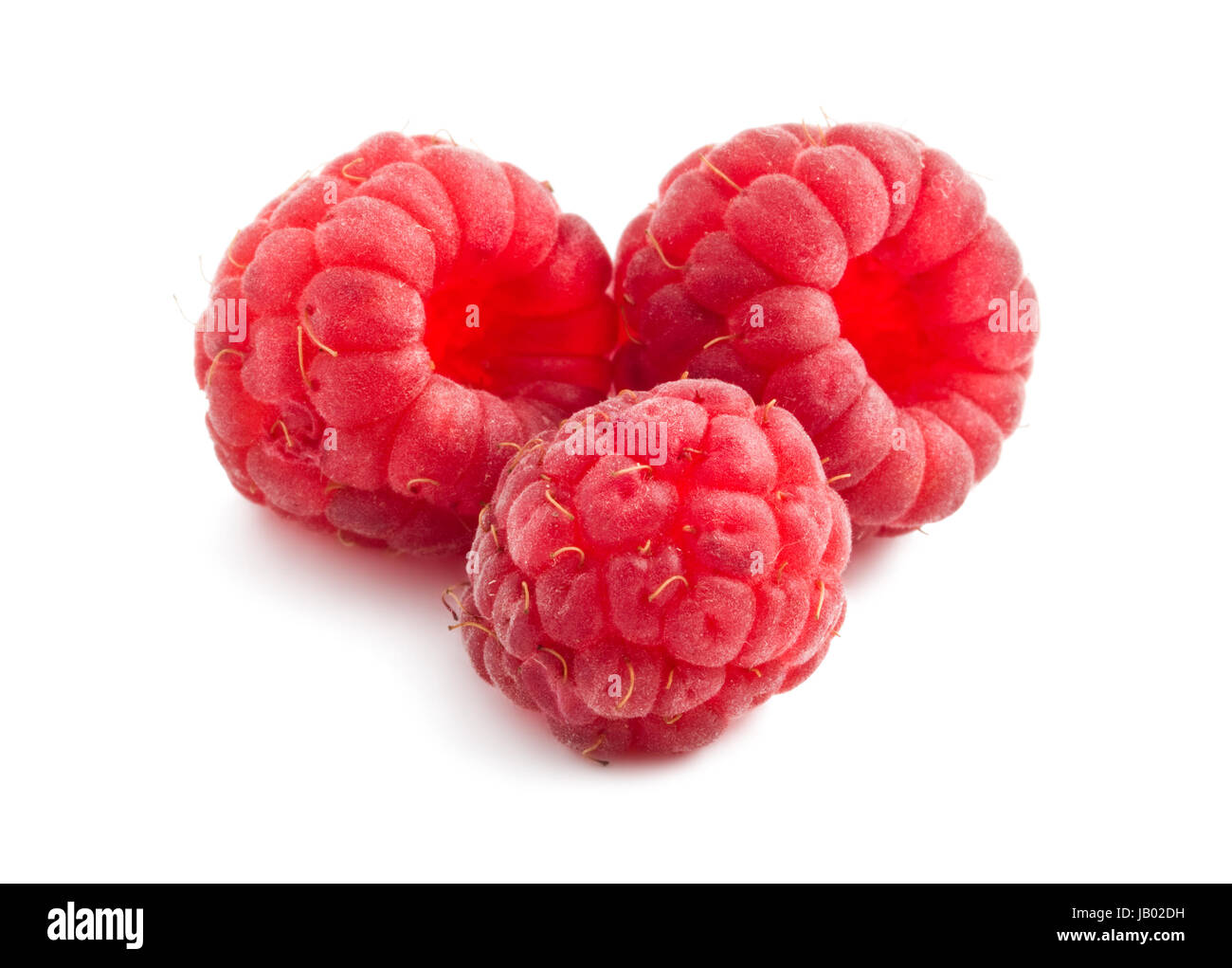 Ripe red raspberries isolated on white background Stock Photo - Alamy