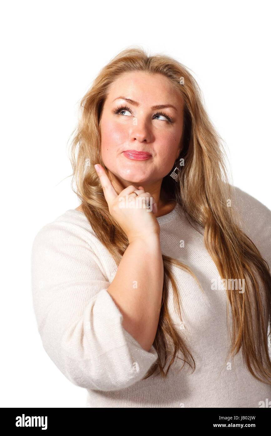 Portrait of young woman looking upwards on a white background Stock ...
