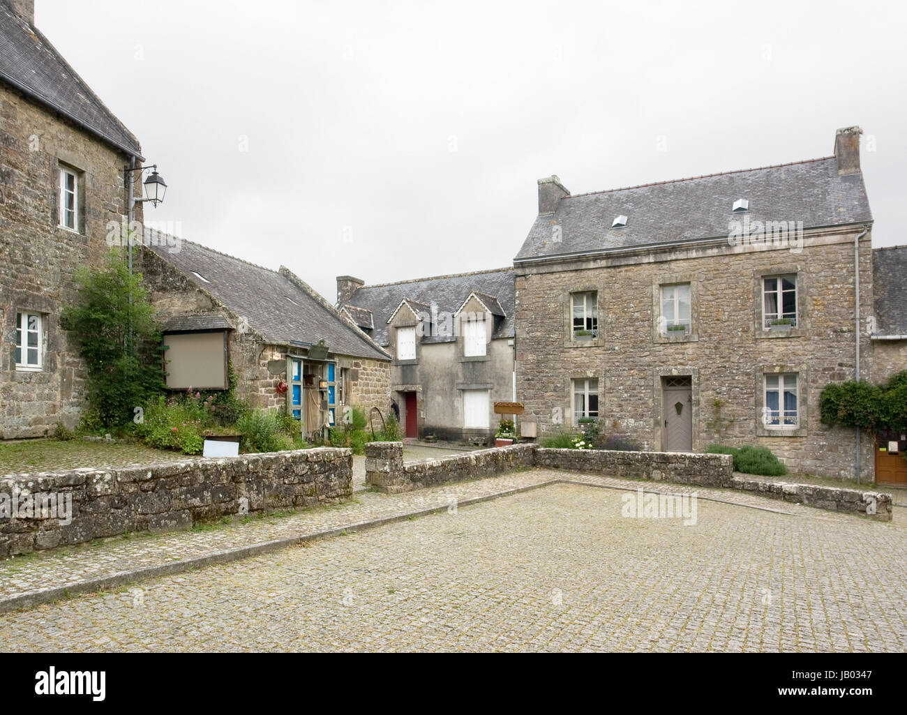 street view of Locronan, a idyllic medieval village in Brittany, France ...