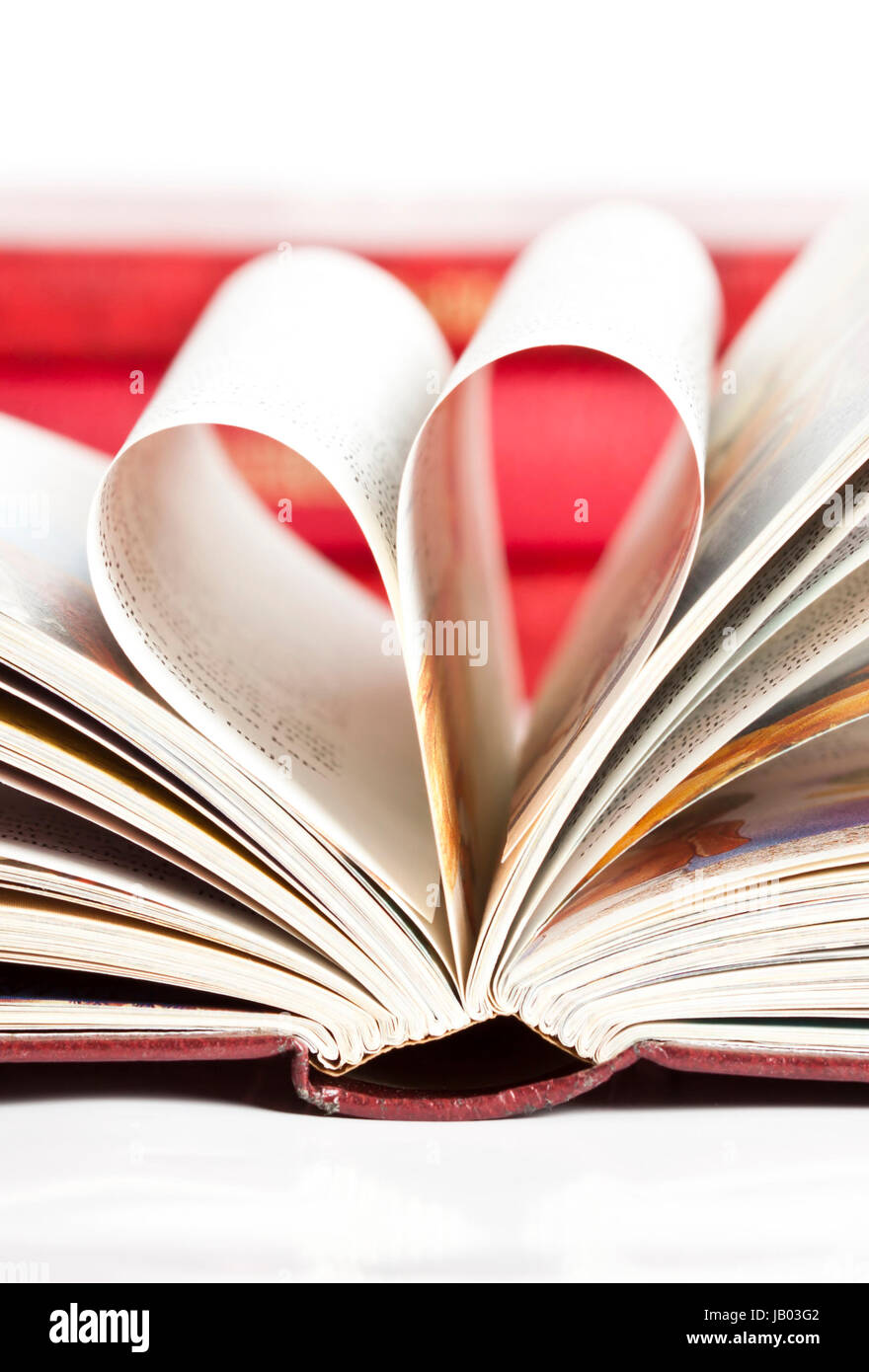 Close up on heart shaped book pages Stock Photo - Alamy