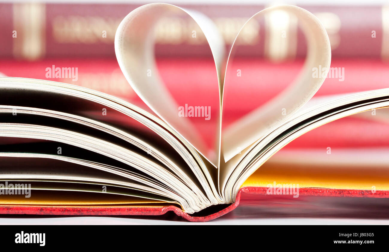 Close up on heart shaped book pages Stock Photo - Alamy