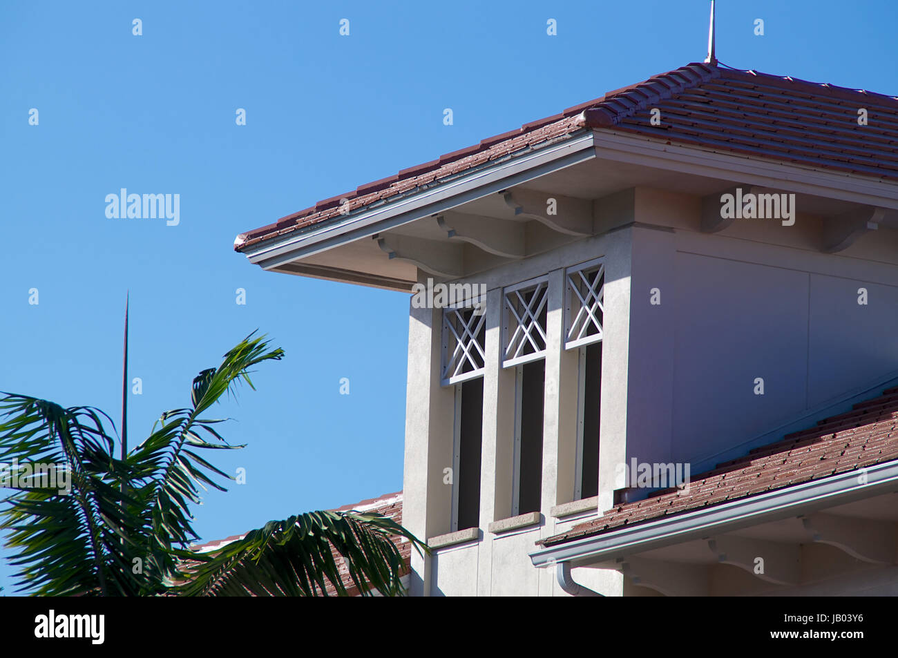 Generic building in florida with three windows Stock Photo - Alamy