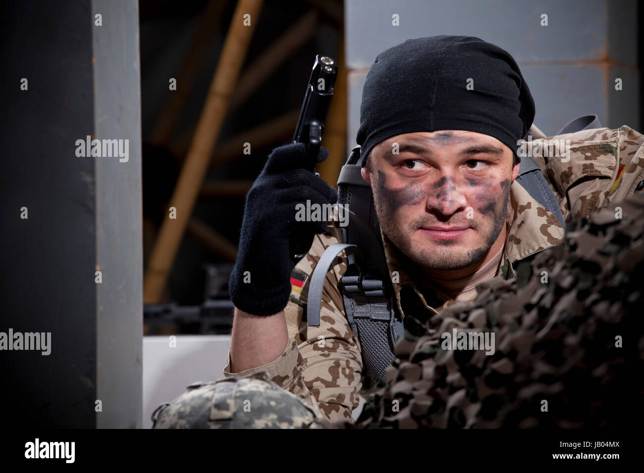 Weapon holding army soldier war hiding violence hi-res stock ...