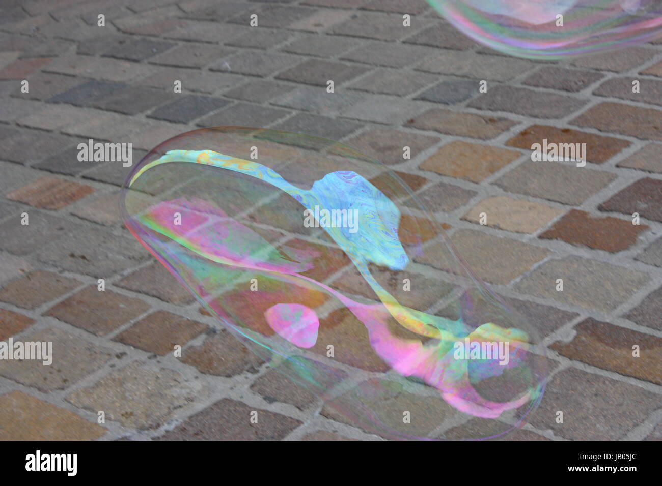 bubble over cobblestone Stock Photo - Alamy