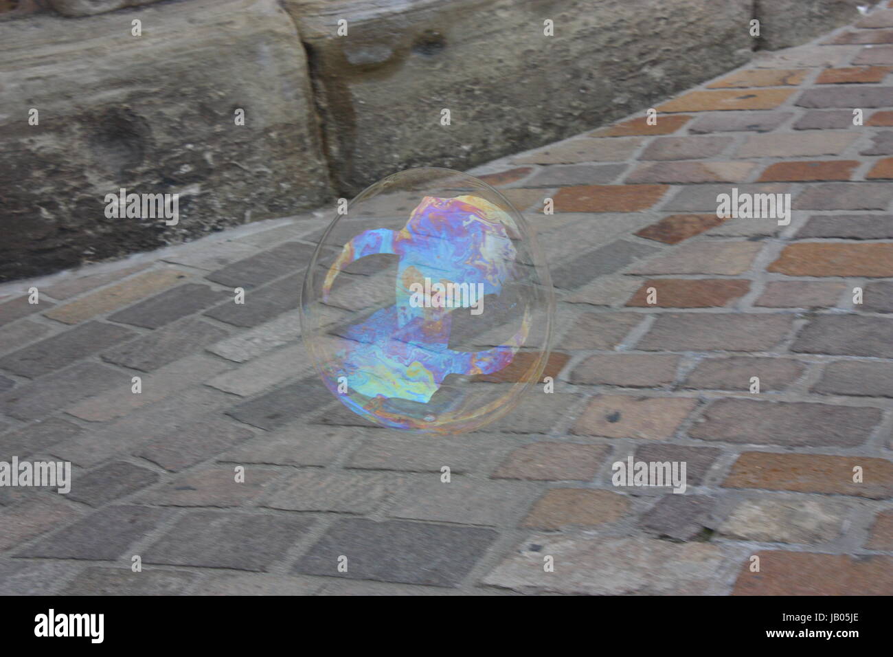 bubble over cobblestone Stock Photo - Alamy