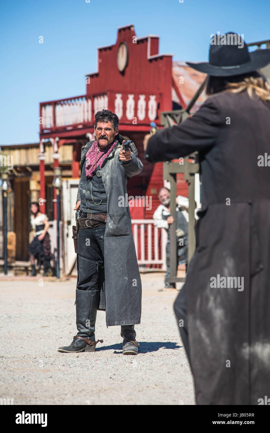A Sheriff Duels Bandit in the Middle of Town Stock Photo - Alamy