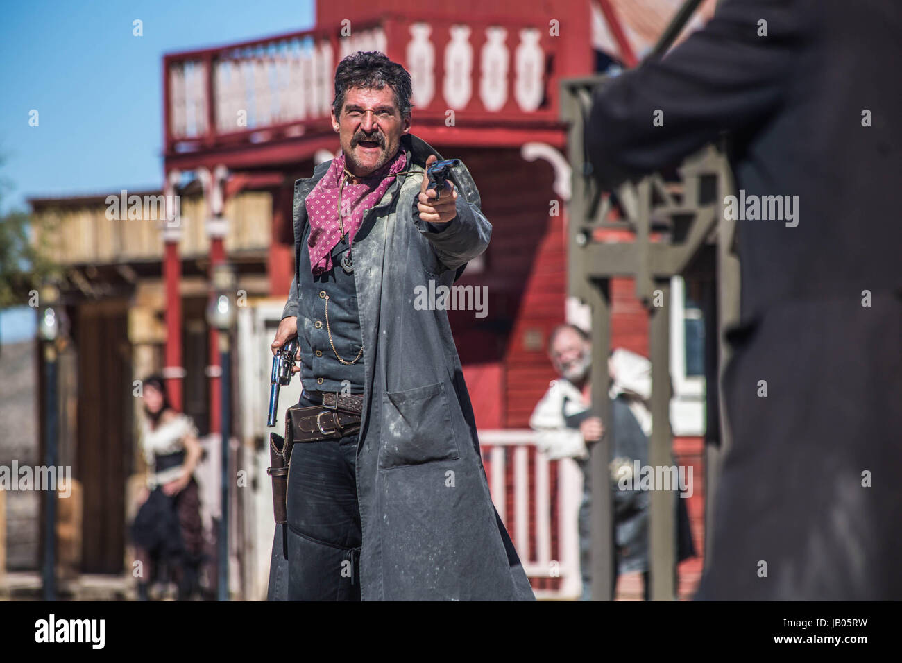 A Sheriff Duels Bandit in the Middle of Town Stock Photo - Alamy