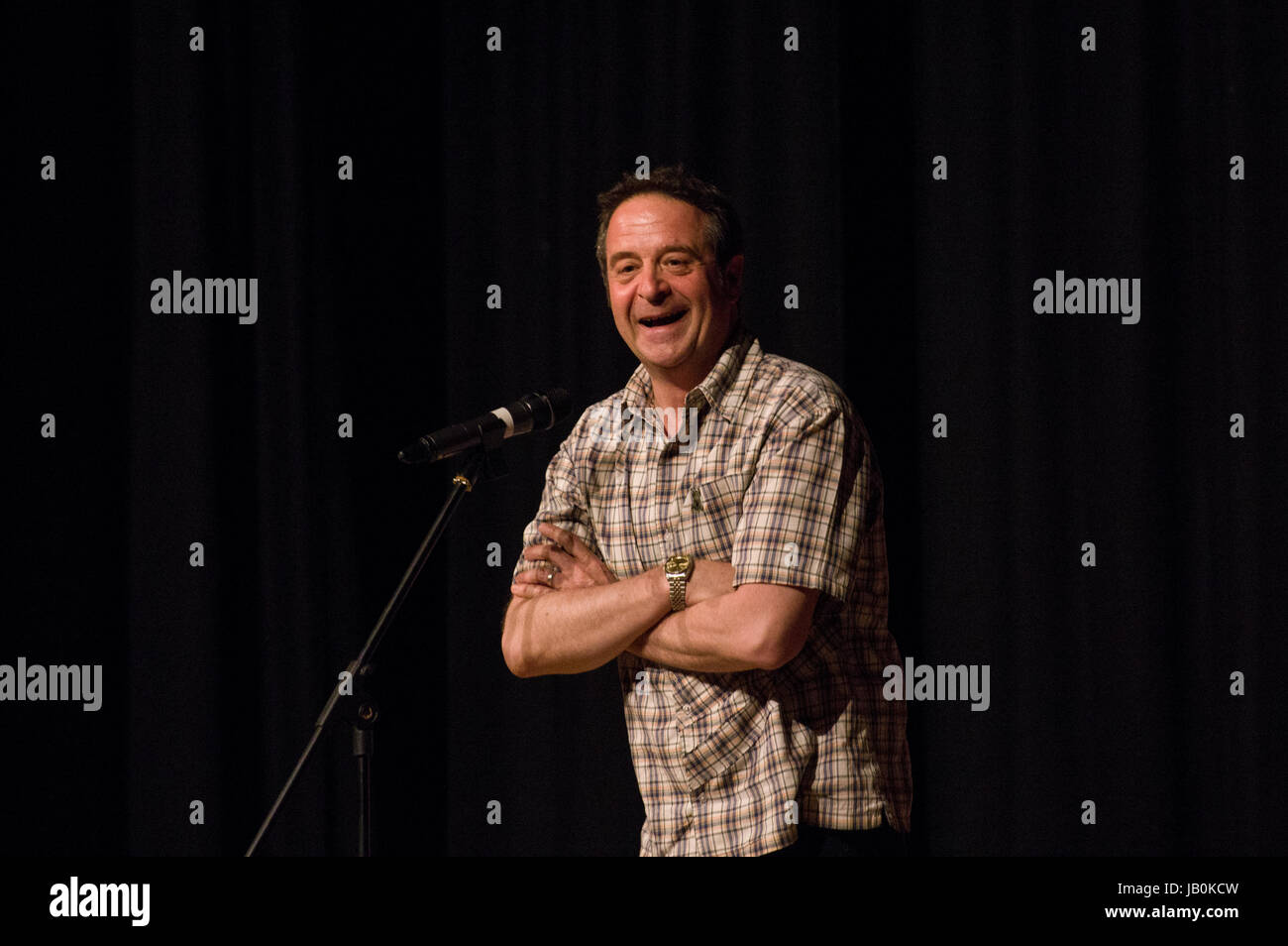 Comedian Mark Thomas speaking in the Town Hall at the 2017 Stoke ...