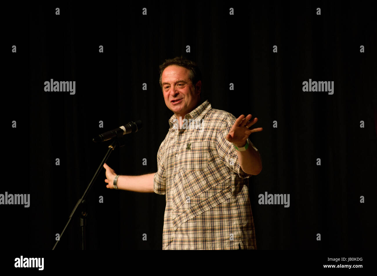 Comedian Mark Thomas speaking in the Town Hall at the 2017 Stoke ...