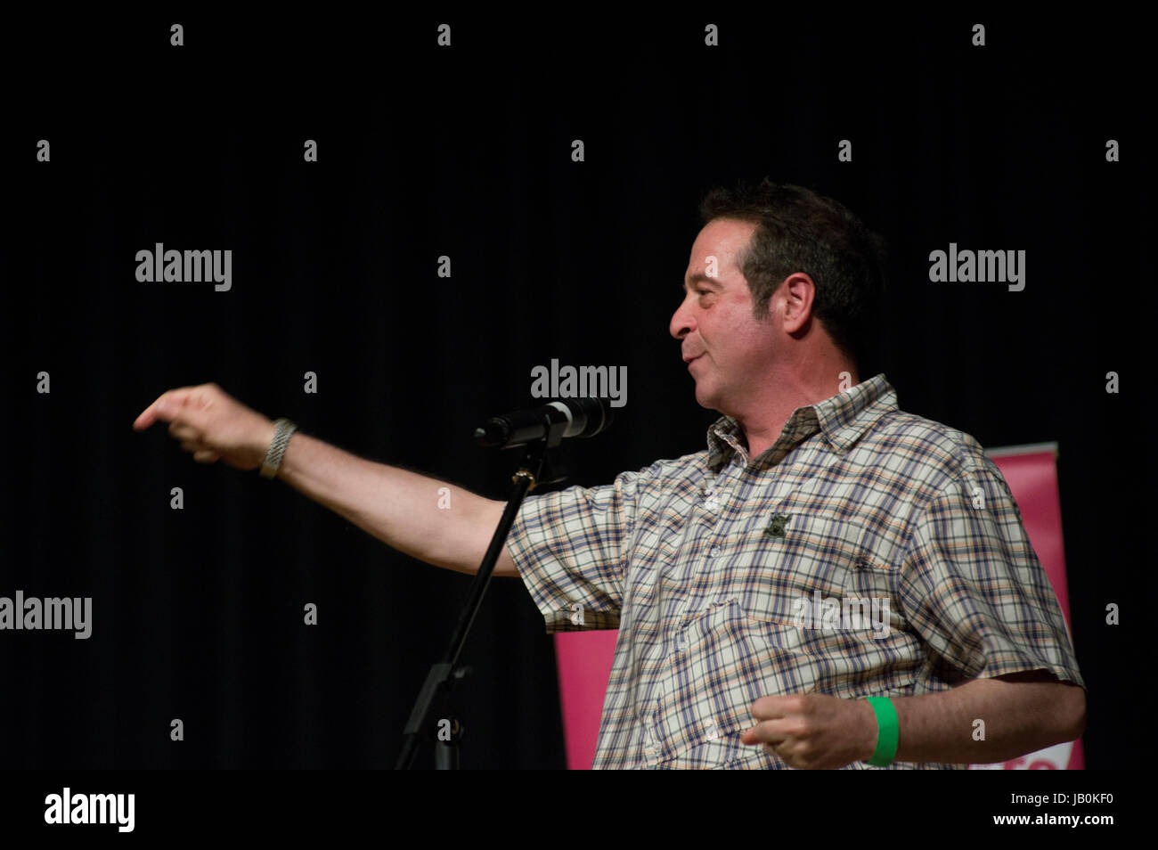 Comedian Mark Thomas speaking in the Town Hall at the 2017 Stoke ...