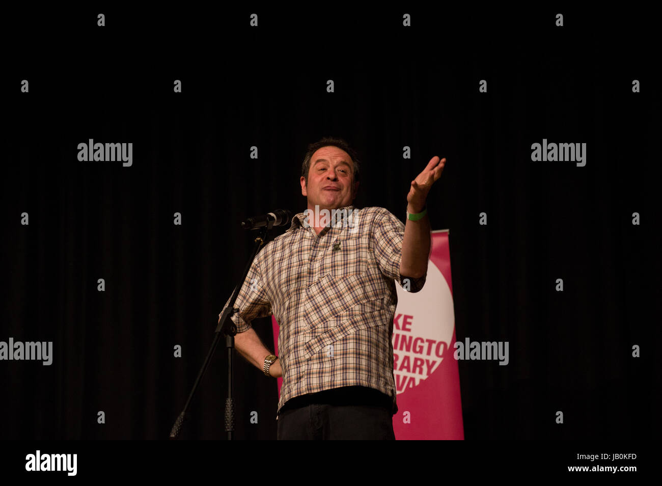 Comedian Mark Thomas speaking in the Town Hall at the 2017 Stoke ...