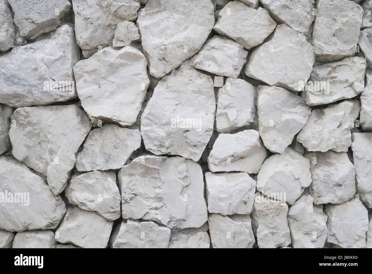 Close up background of white stone wall architecture wallpaper Stock ...