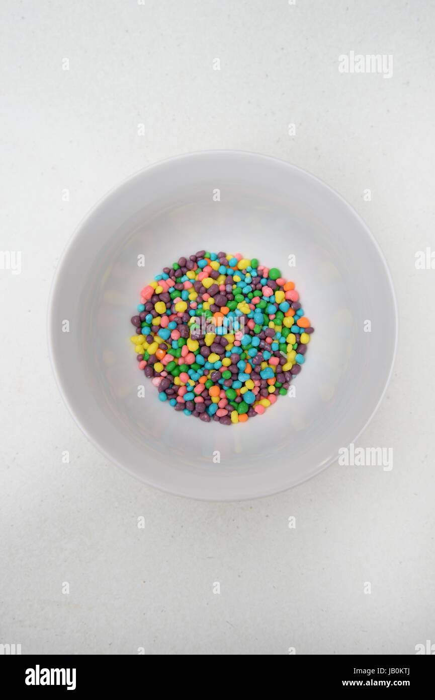 Food decorating sprinkles isolated on a kitchen bench Stock Photo - Alamy