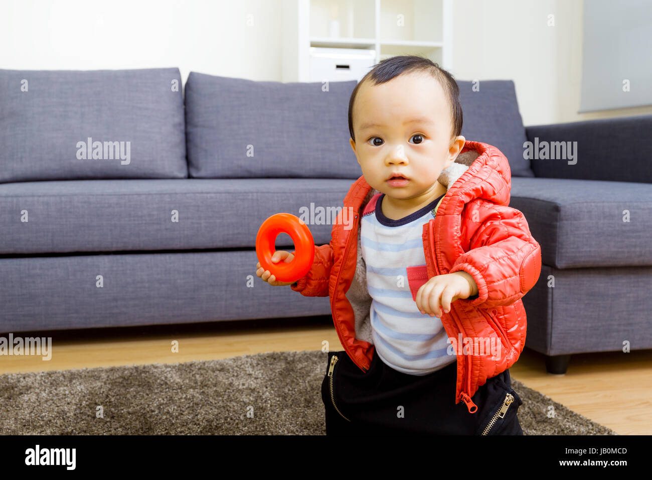 Baby boy play at home Stock Photo - Alamy