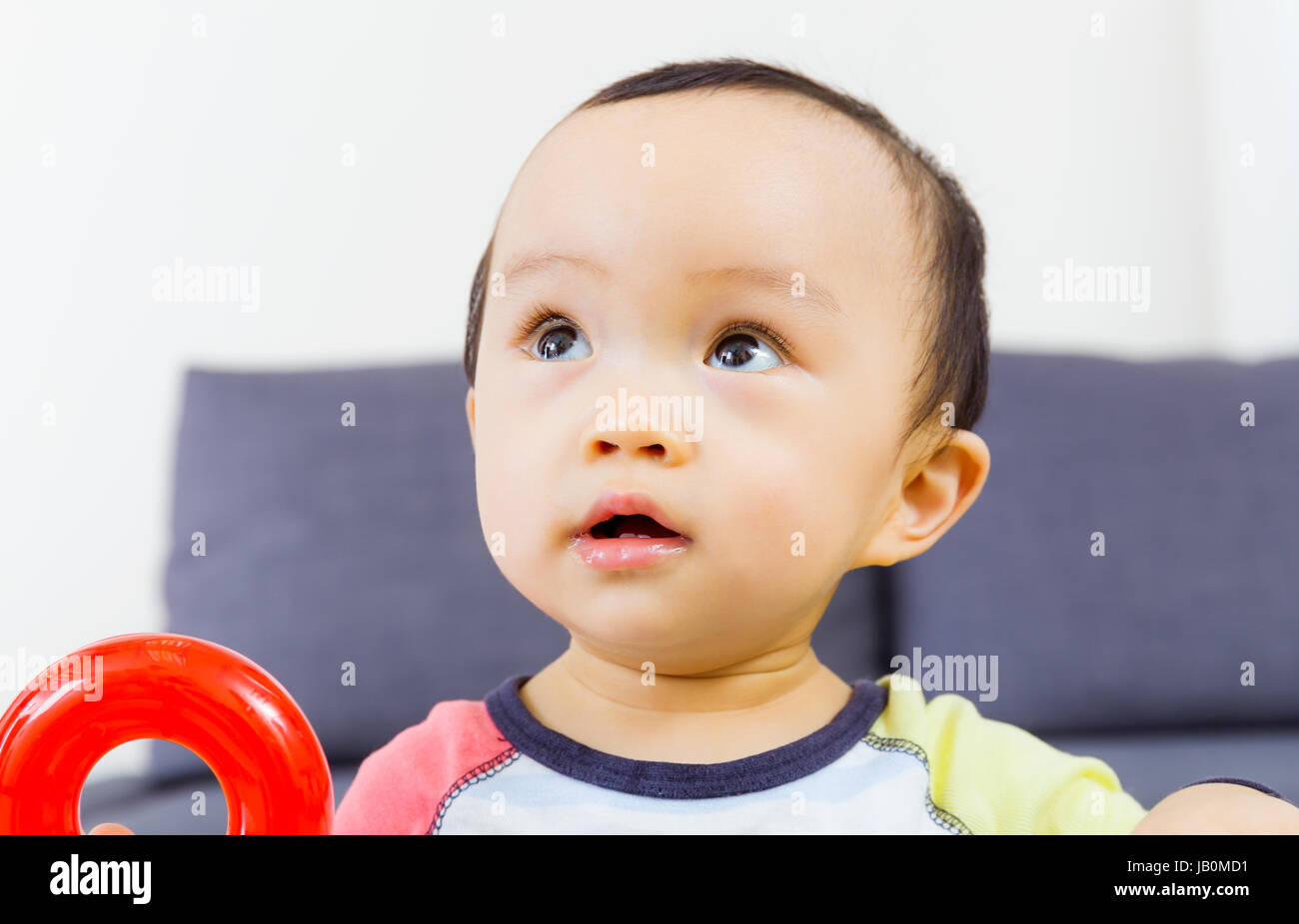 Asian baby play toy at home Stock Photo - Alamy