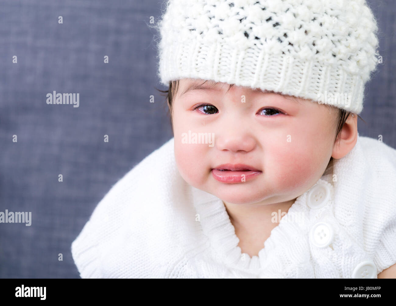 Baby and tearful lady hi-res stock photography and images - Alamy