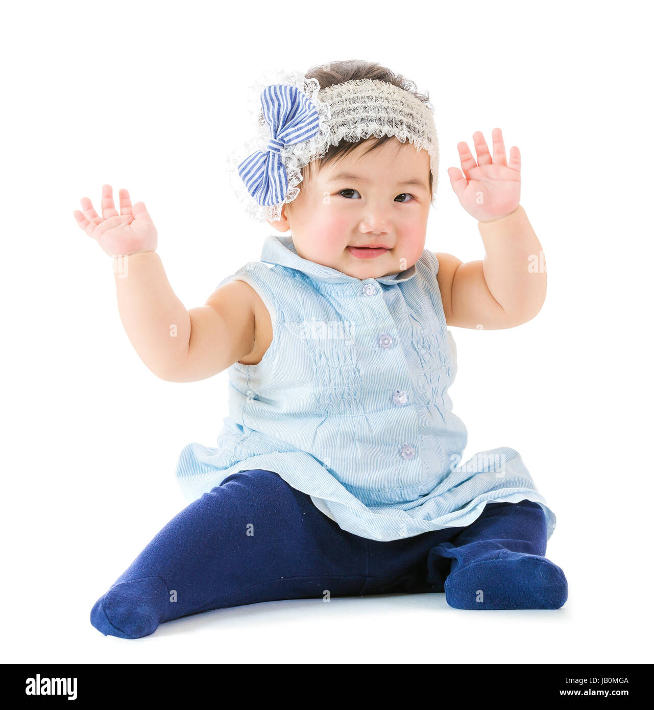 Asian baby girl hand up Stock Photo - Alamy