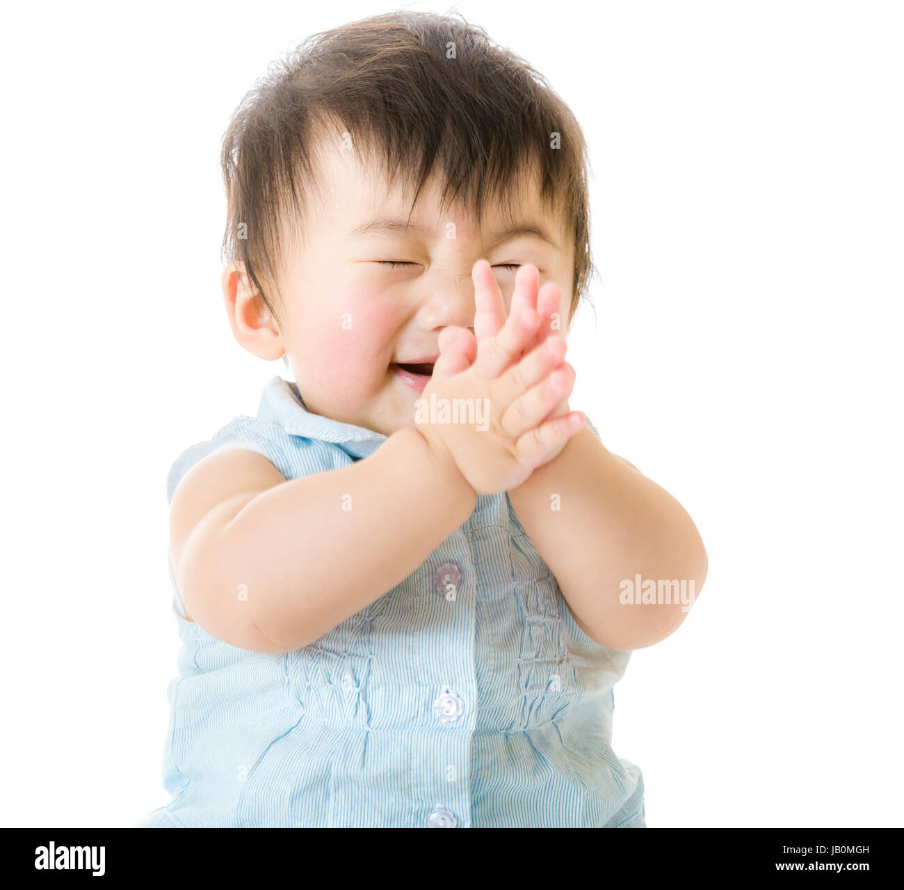 Baby girl clapping Stock Photo - Alamy