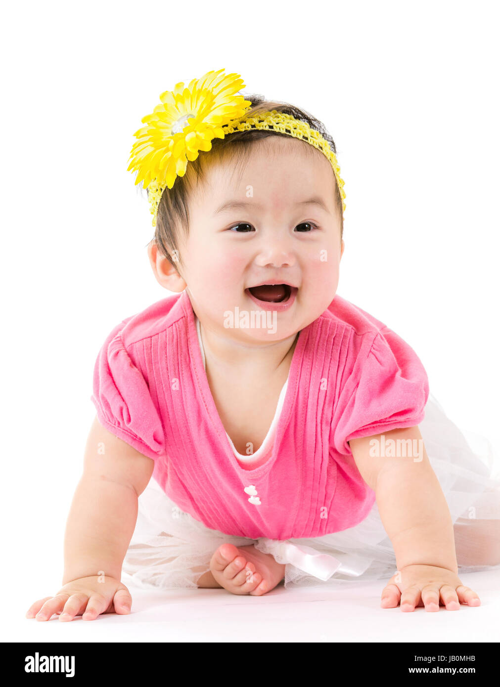 Asian baby girl creeping Stock Photo - Alamy