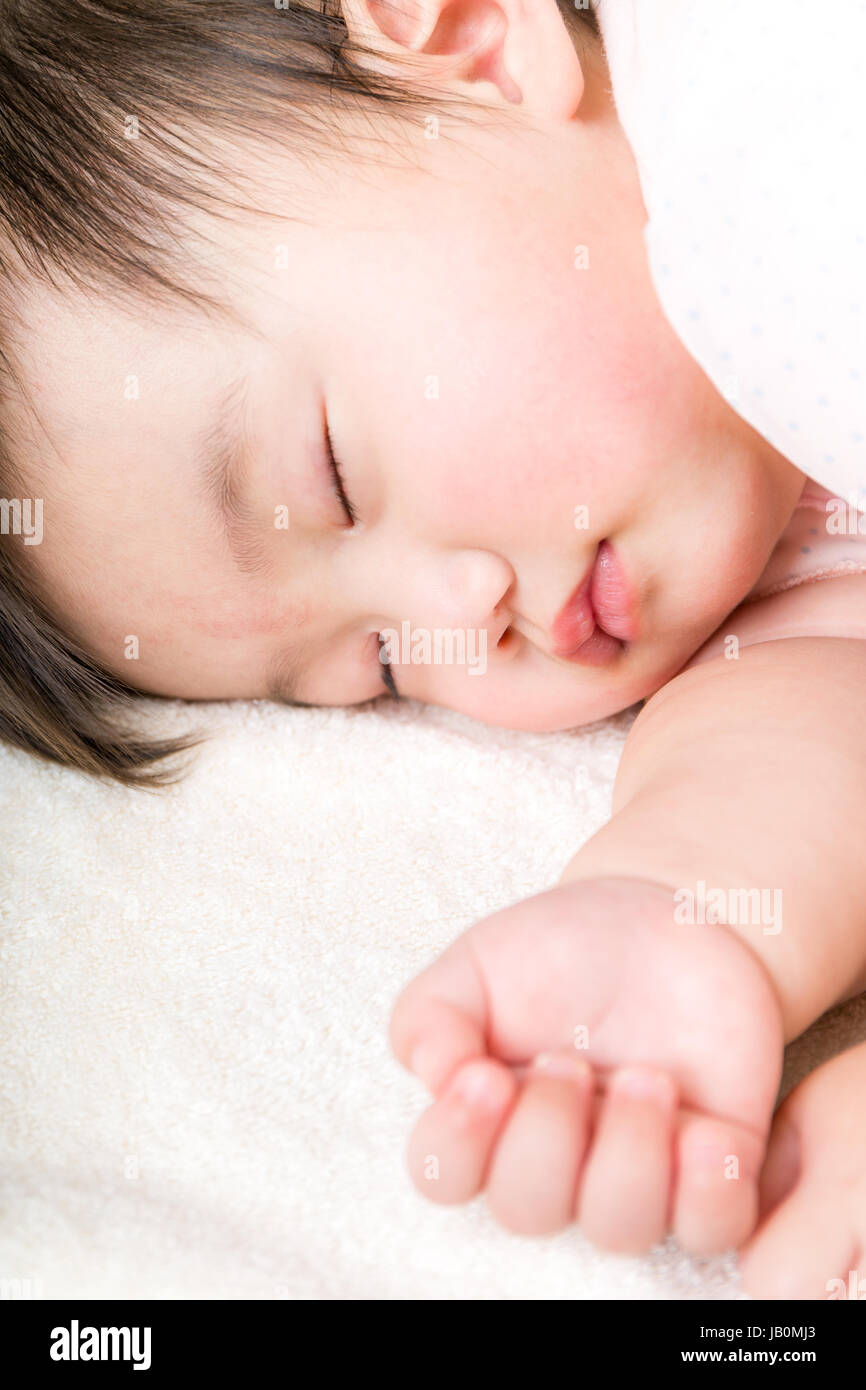 Asian baby sleeping Stock Photo - Alamy