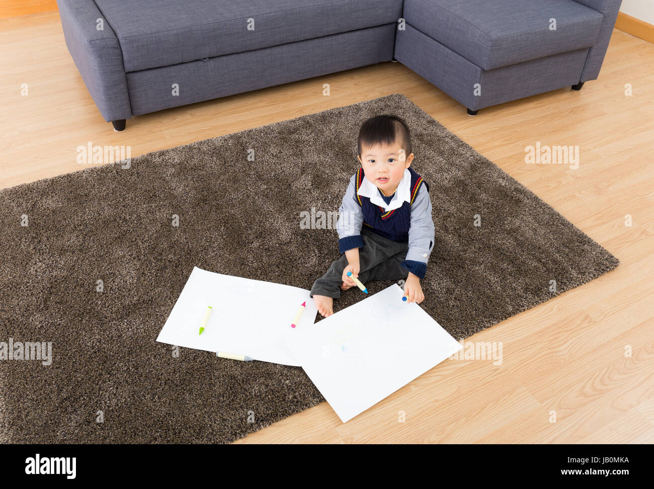 Asian baby boy drawing picture Stock Photo - Alamy