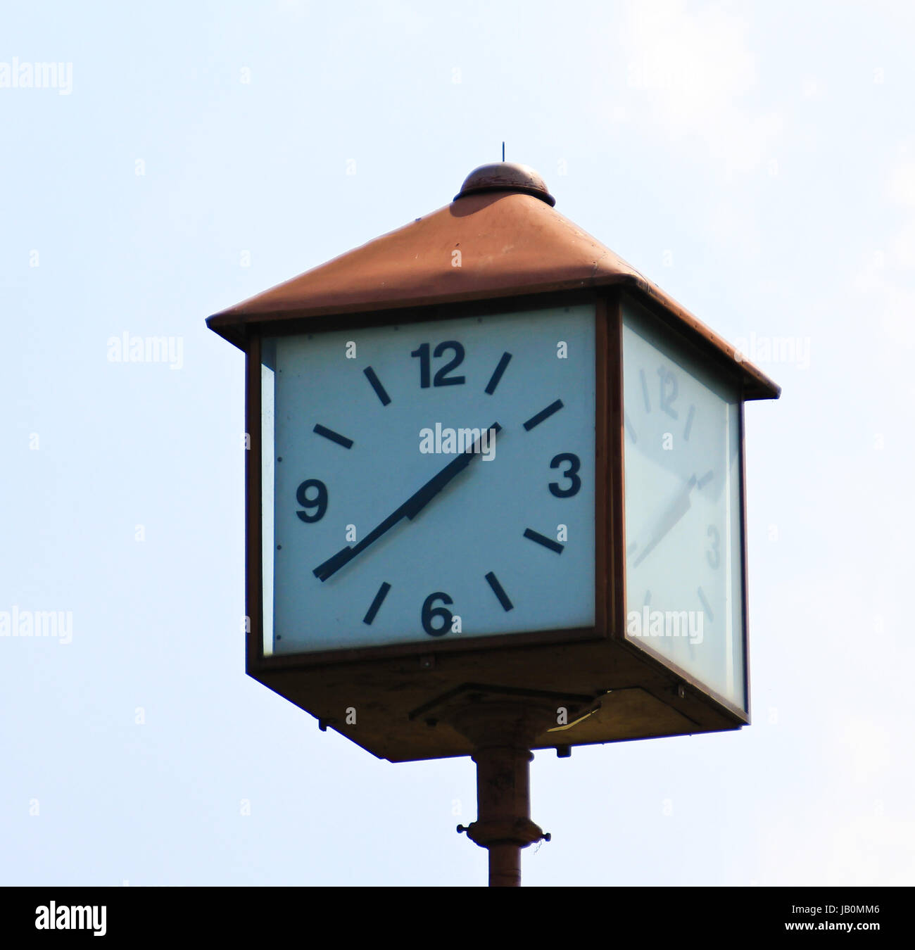 Clock in the sky Stock Photo - Alamy