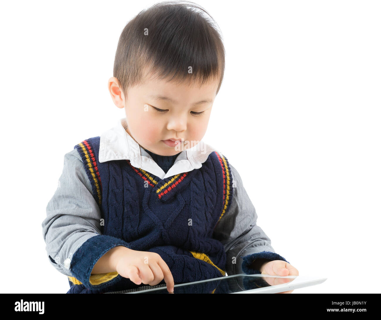 Little boy using tablet Stock Photo - Alamy