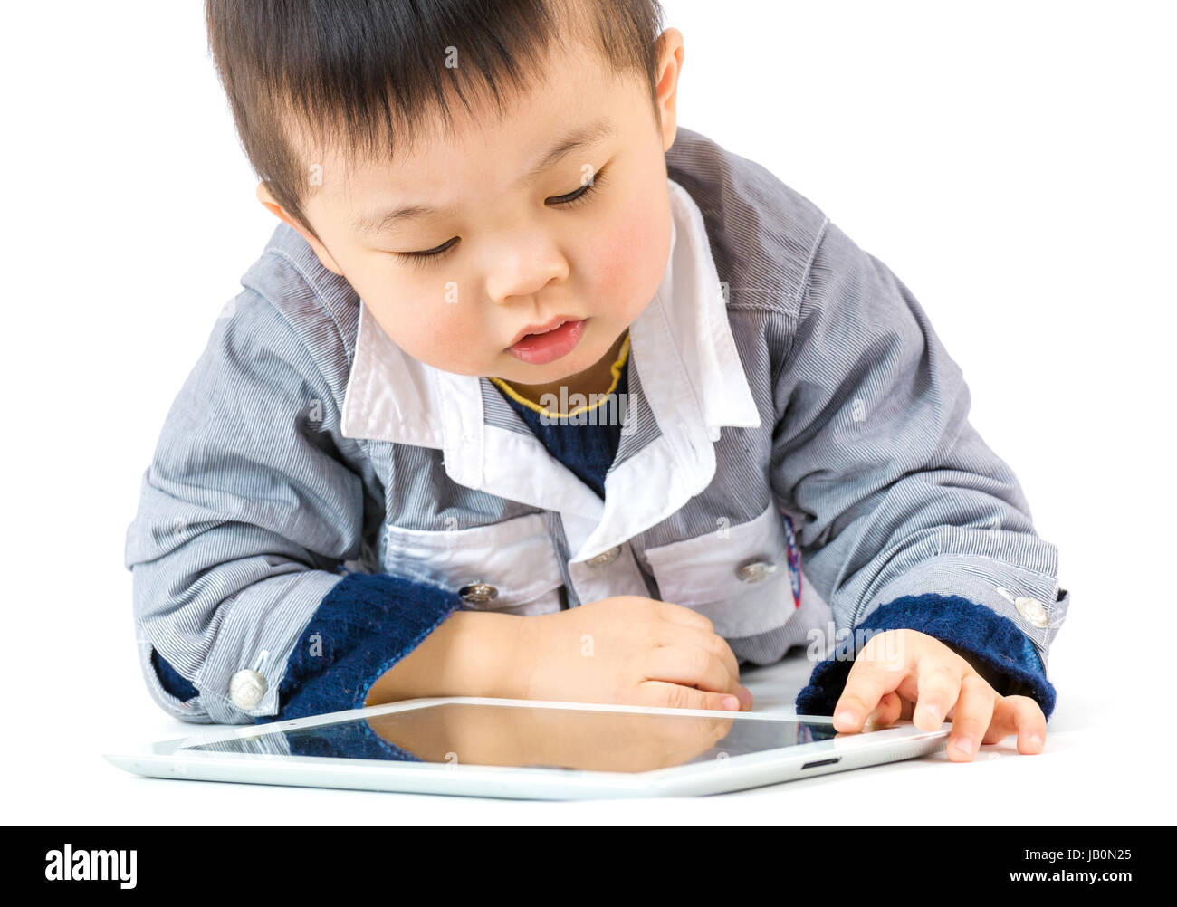 Asian baby boy using tablet Stock Photo - Alamy