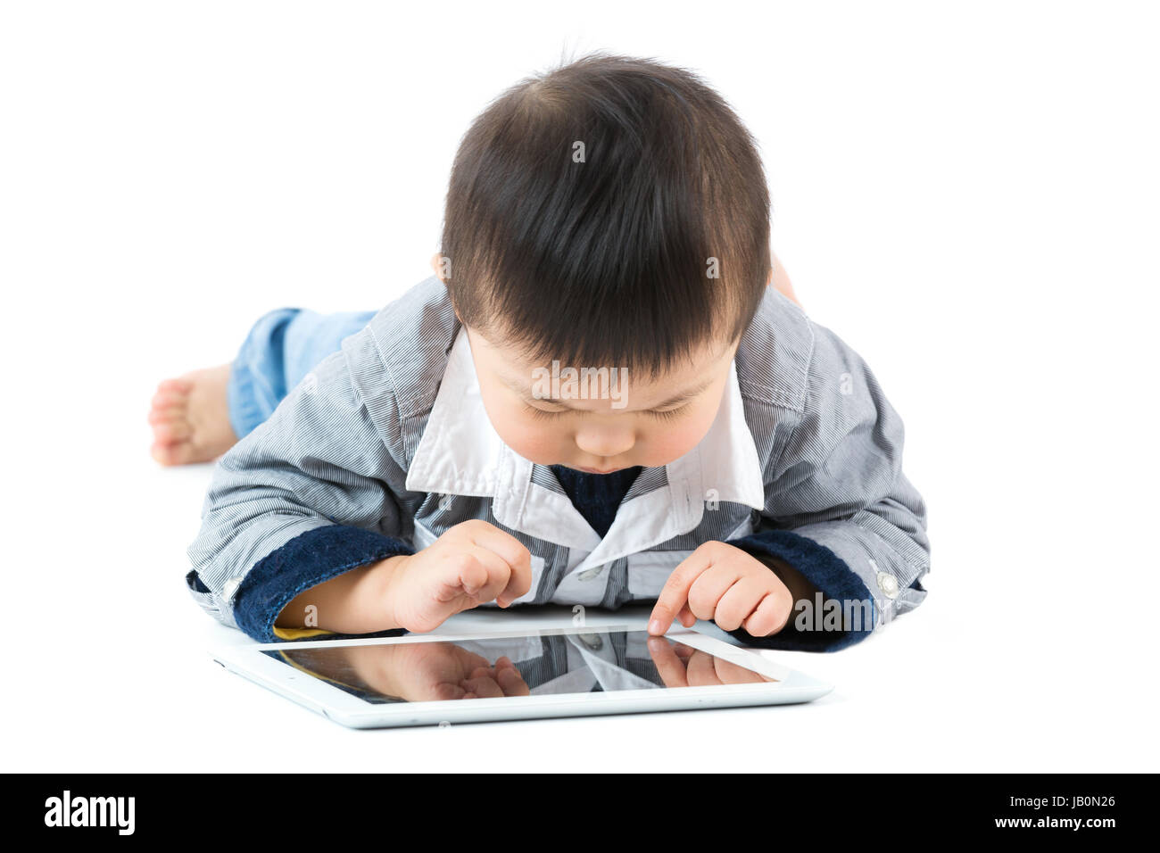Little baby boy using tablet Stock Photo - Alamy