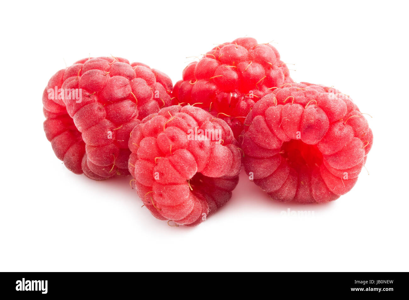 Ripe red raspberries isolated on white background Stock Photo - Alamy
