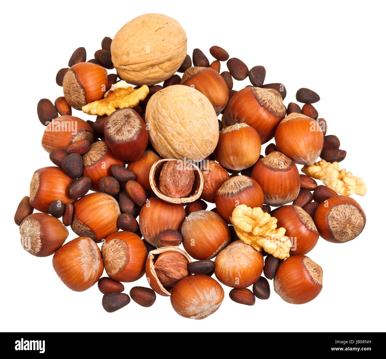 handful of dried nuts isolated on white background Stock Photo - Alamy