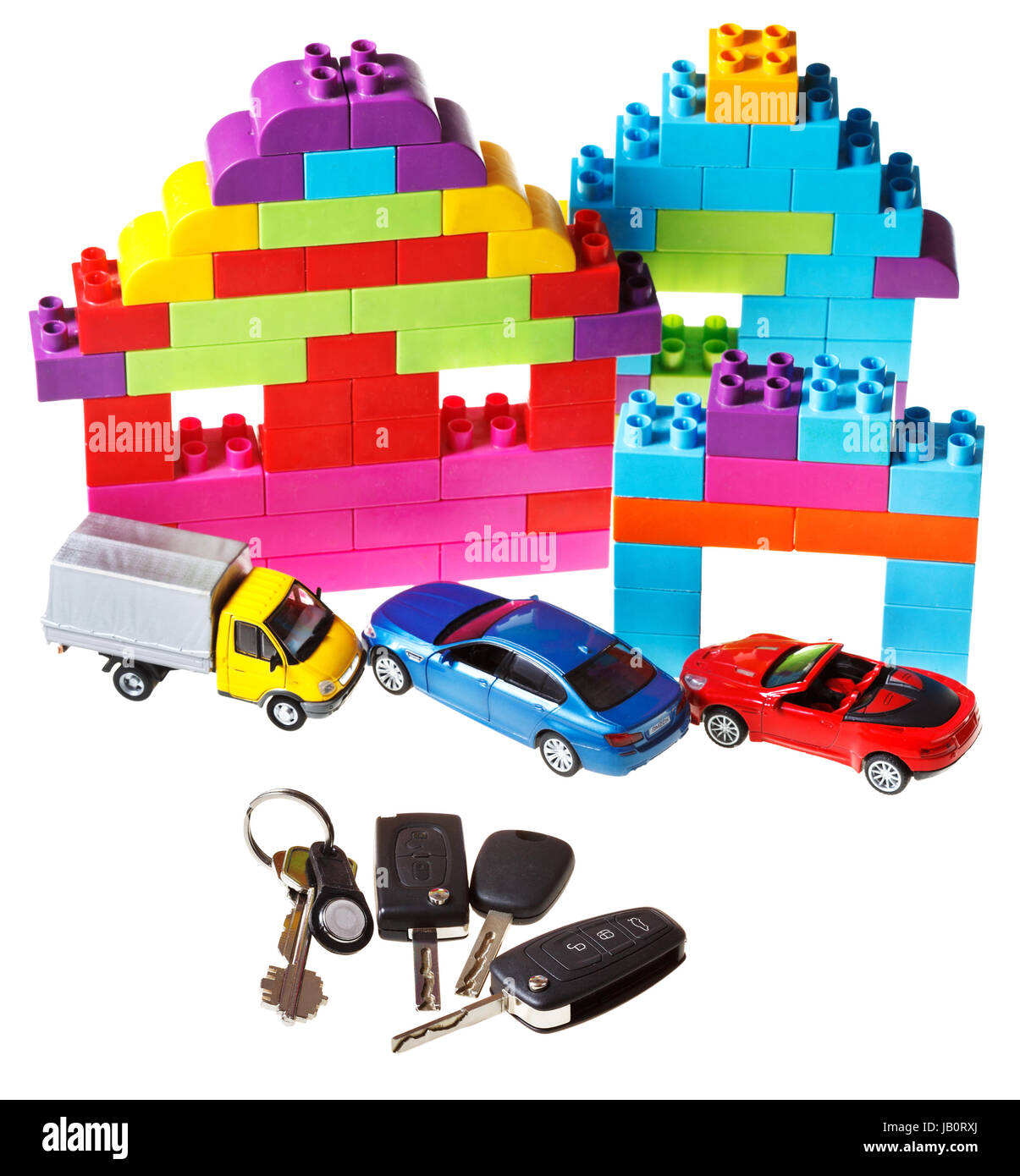 door key, vehicle keys, three model cars and plastic block house ...