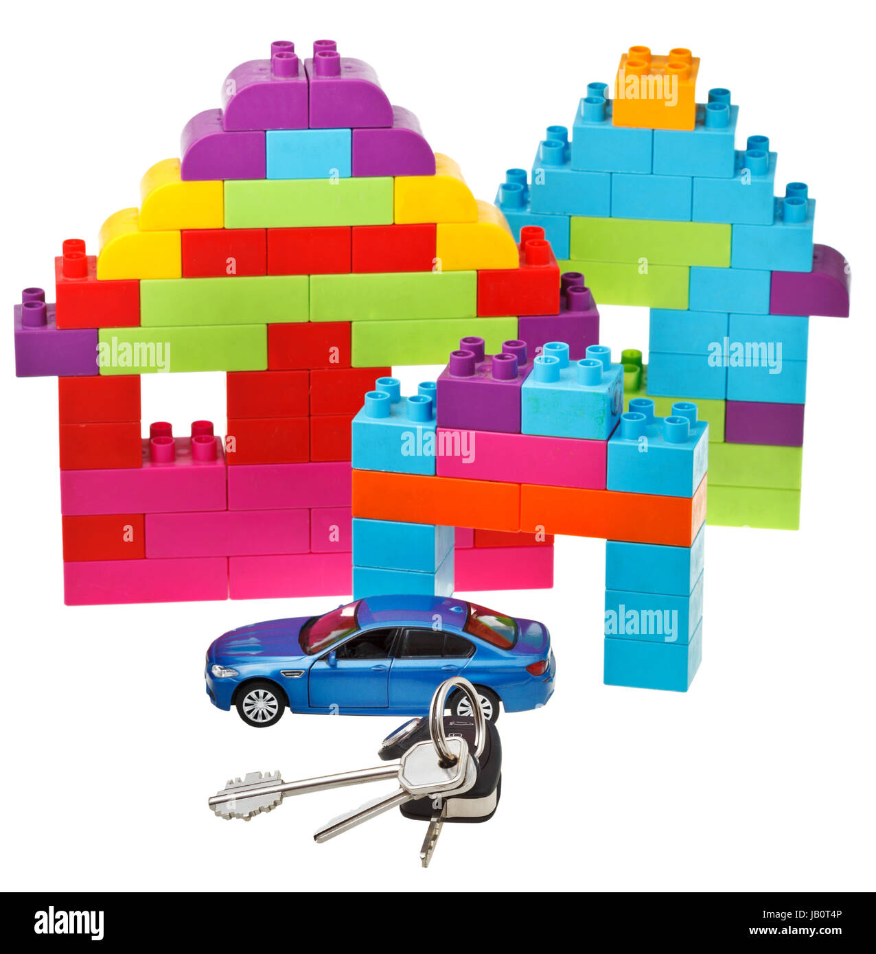 plastic block house, door and car keys, blue model car isolated on ...
