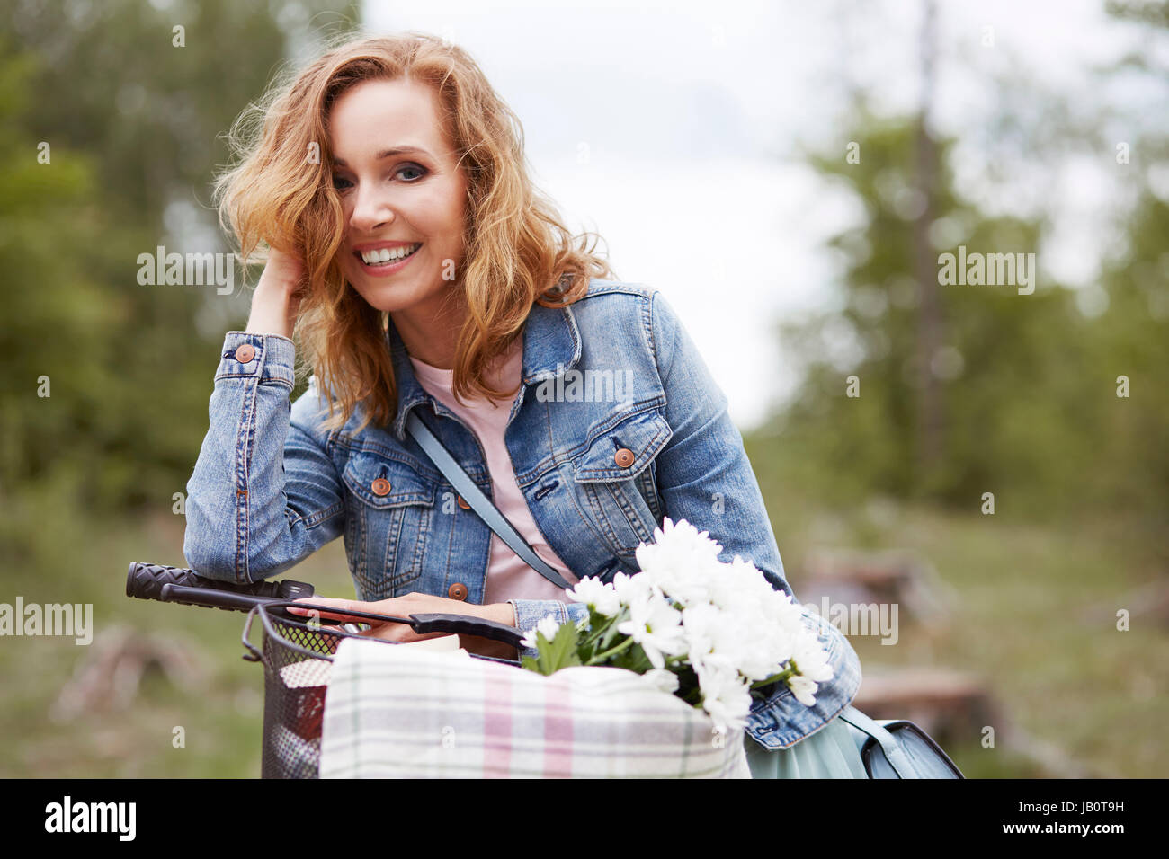 Beautiful woman cycling in hi-res stock photography and images - Alamy