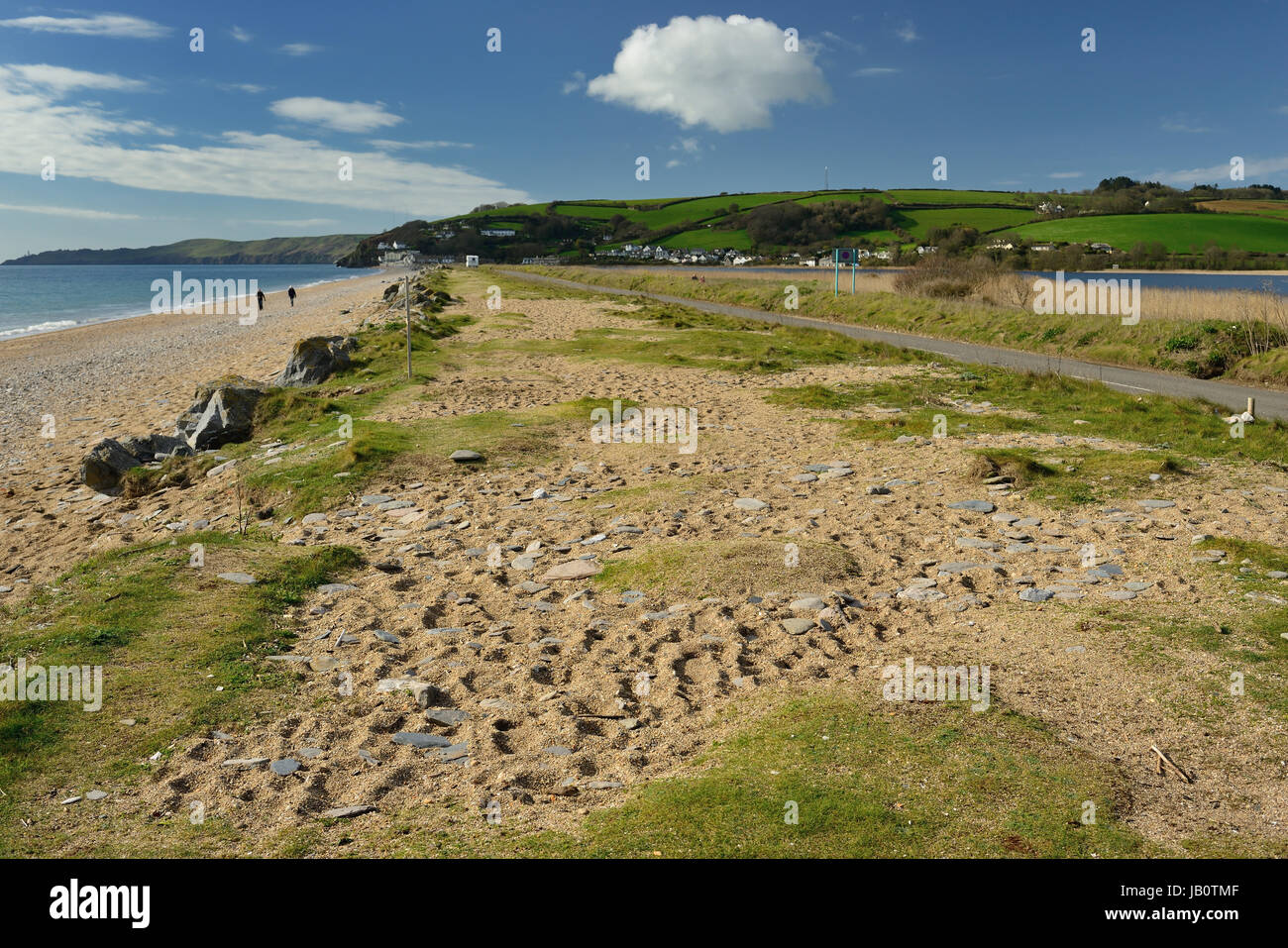Rocks and footprints in the sand Stock Photo - Alamy