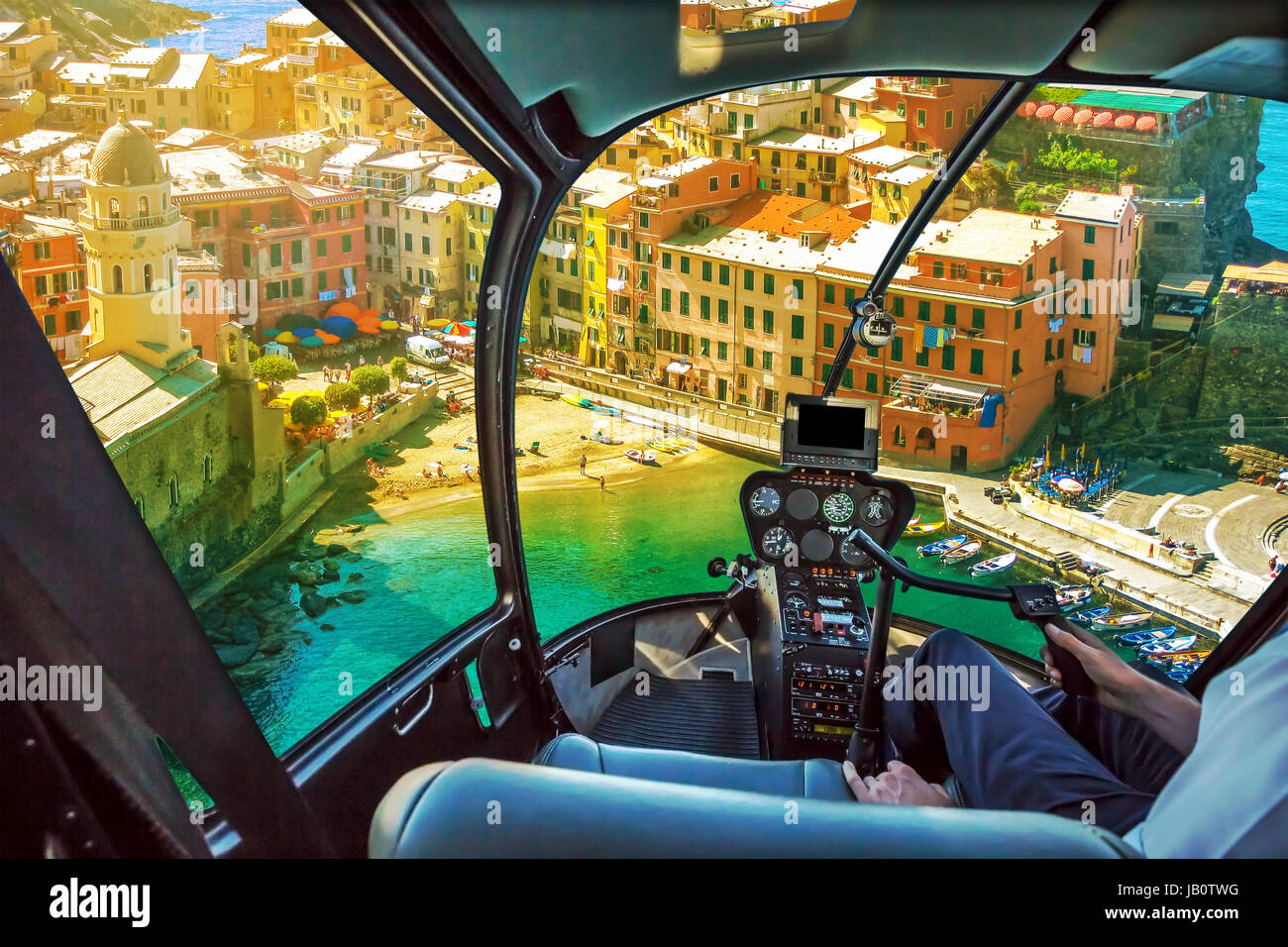 Helicopter cockpit with pilot arm and control console inside the cabin ...