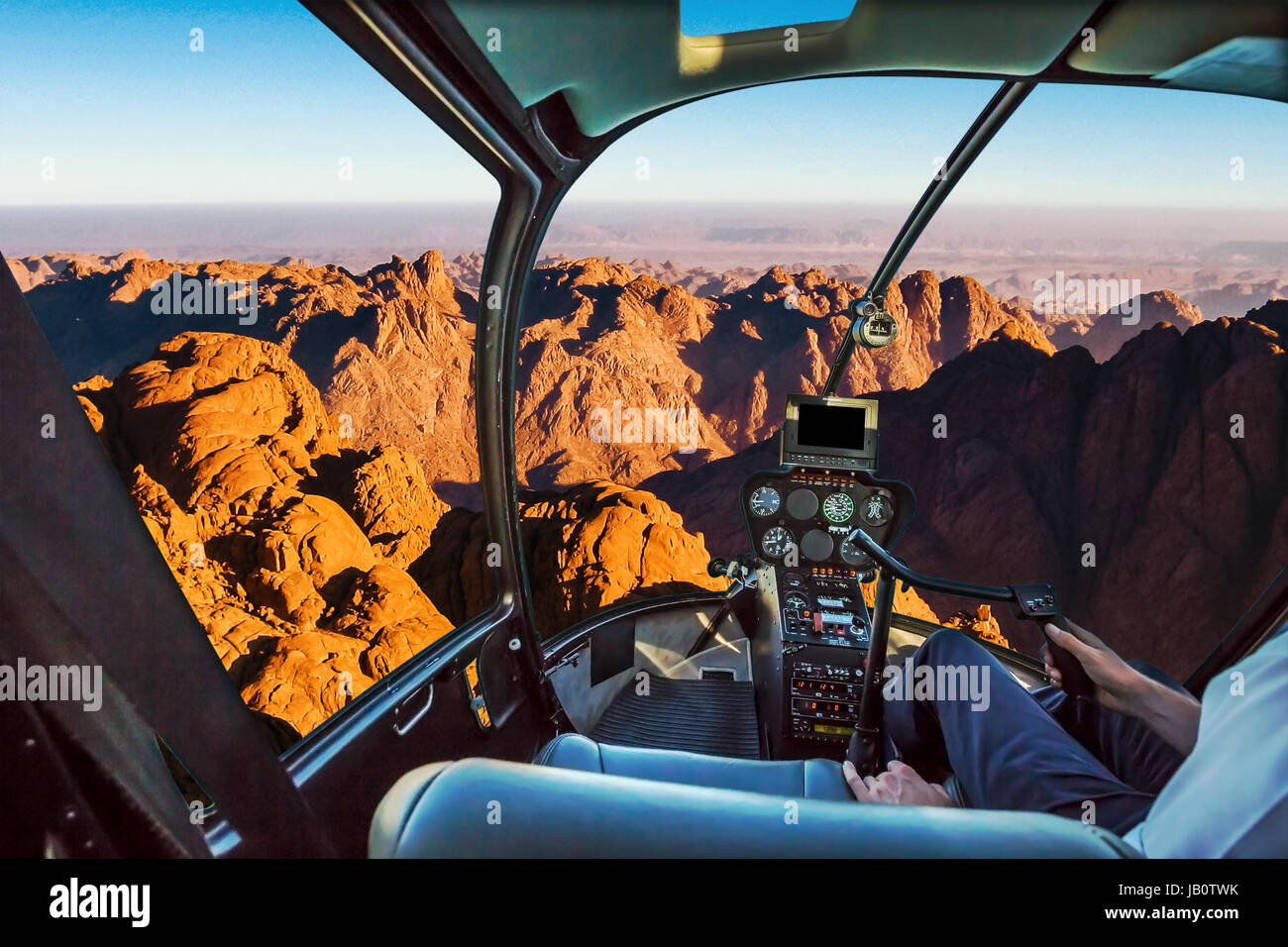 Helicopter cockpit flight aerial view of the holy summit of Mount Sinai ...