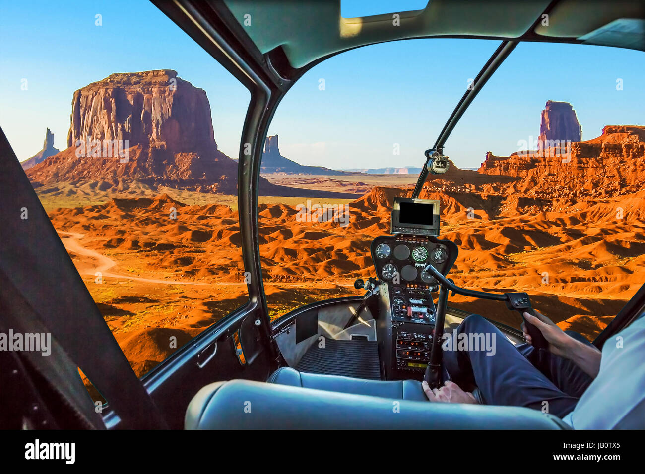 Helicopter cockpit with pilot arm and control console inside the cabin ...