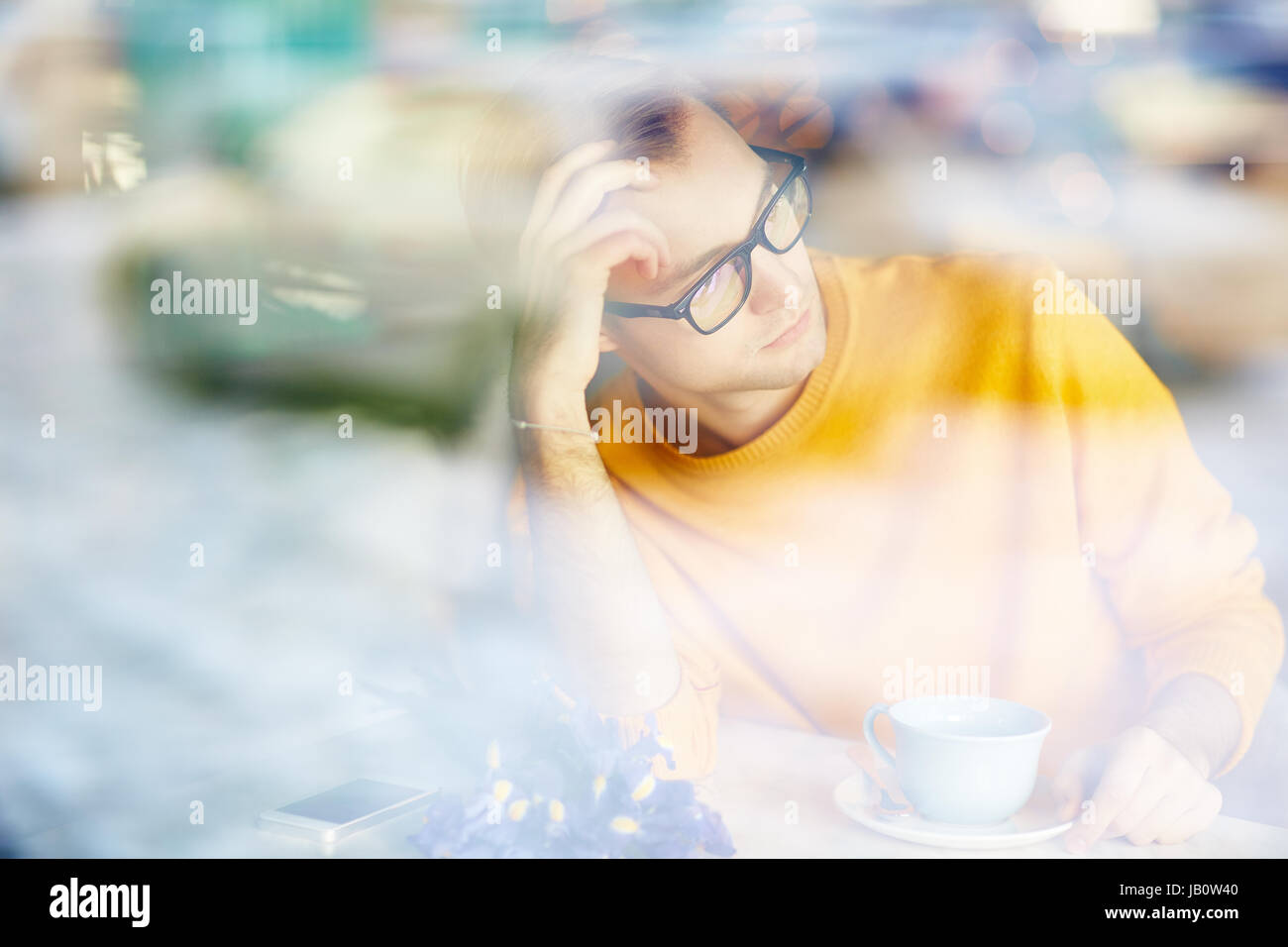 Man waiting alone in restaurant hi-res stock photography and images - Alamy