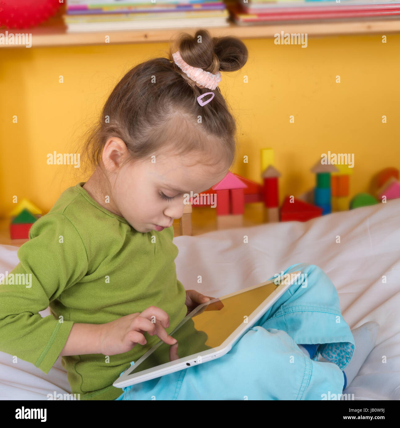 small girls with tablet Stock Photo - Alamy