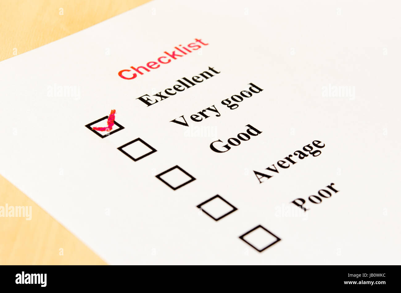 Check list form with check boxes and a red Stock Photo - Alamy