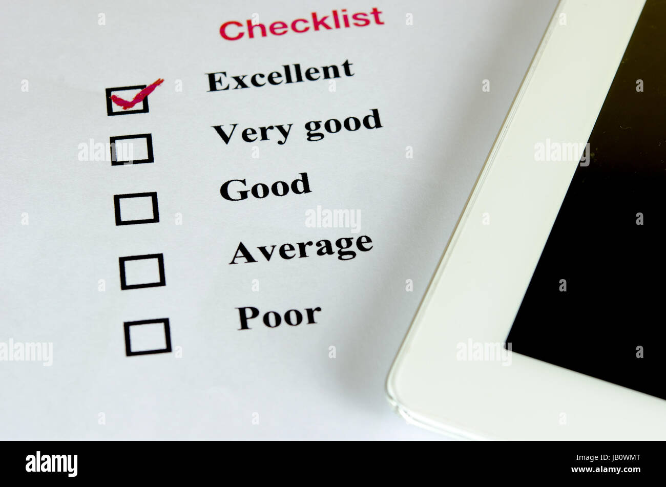 Check list form with check boxes and a red Stock Photo - Alamy