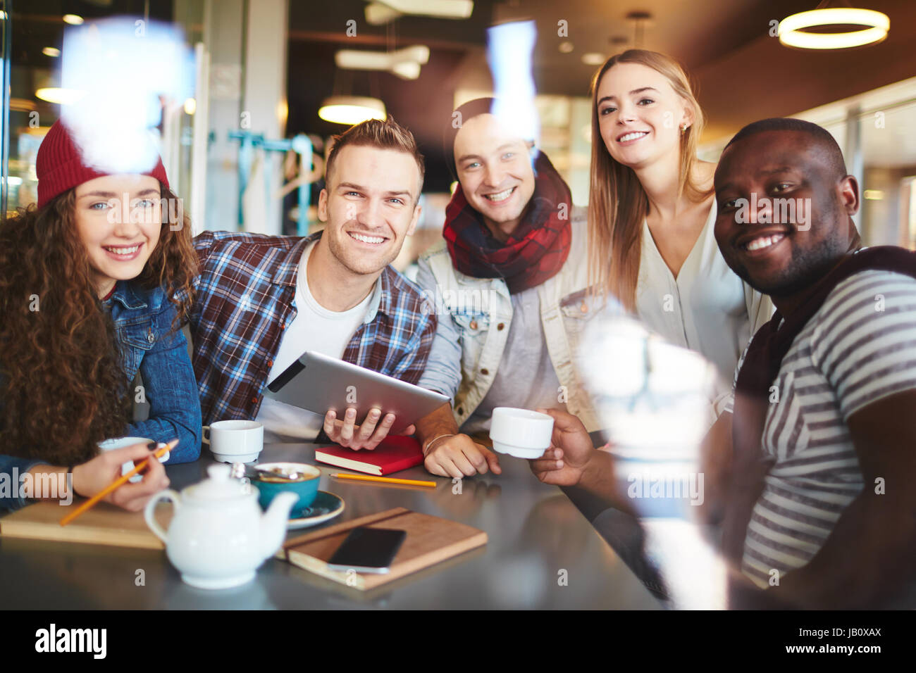 Enthusiastic Managers Working from Coffeehouse Stock Photo - Alamy