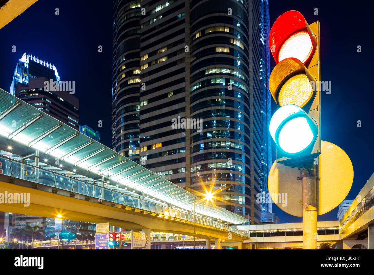 Traffic light in city at night Stock Photo - Alamy
